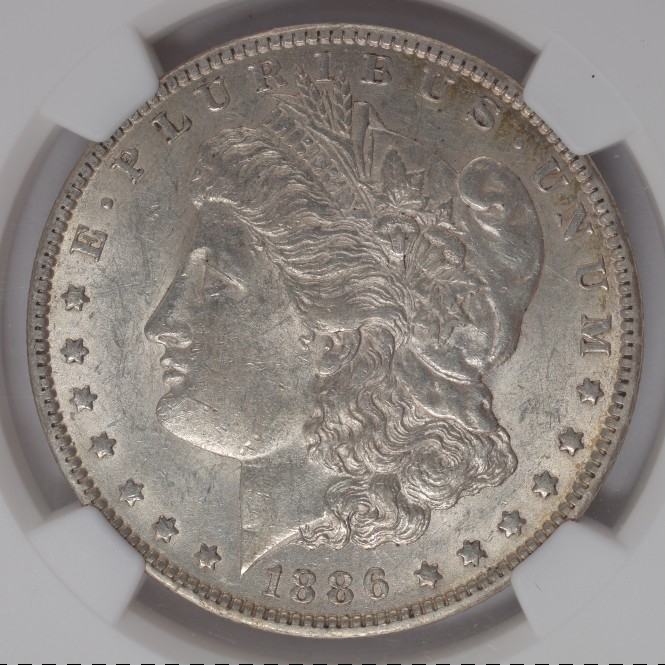 1886-O U.S. $1 - Morgan Silver Dollar - NGC AU55