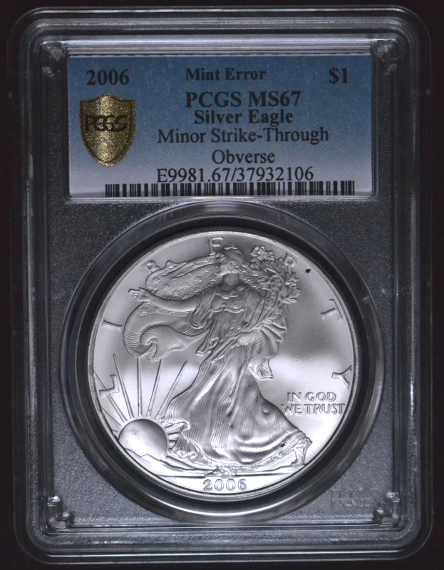 2006 $1 American Silver Eagle Mint Error Minor Strike Through - PCGS MS67